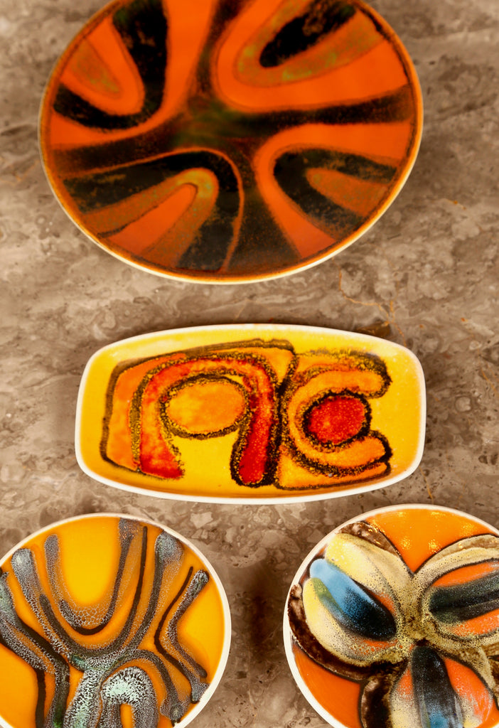 2 Poole pottery pin dishes (1960s) UK – a fold of chairs